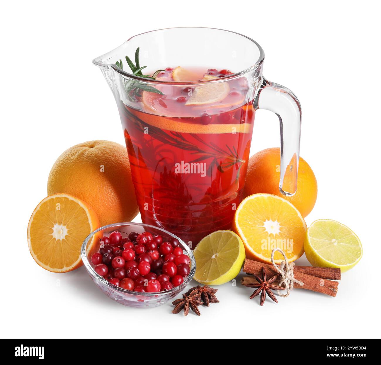 Aromatic punch drink in glass jug and ingredients on white background ...