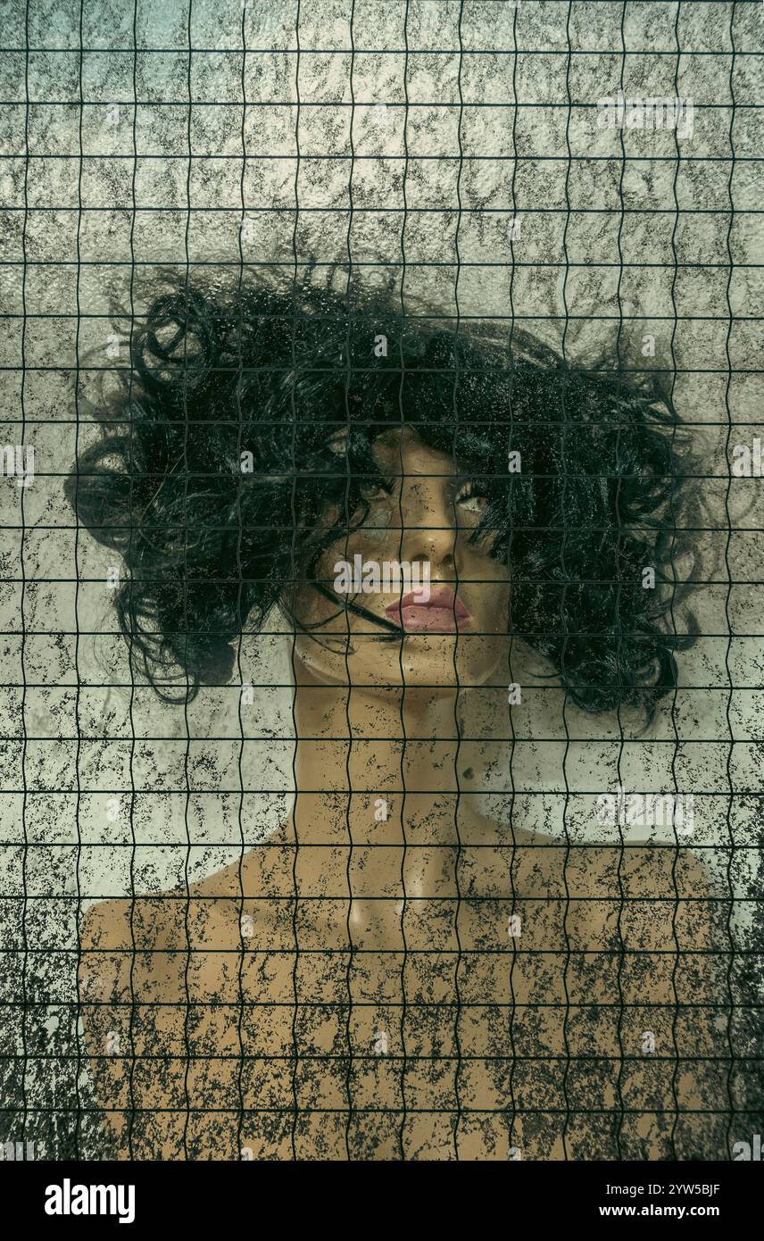 Shop dummy, mannequin, behind dirty safety glass window Stock Photo - Alamy