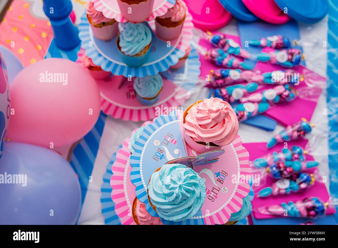 blue and pink decorations and sweets for a party Stock Photo - Alamy