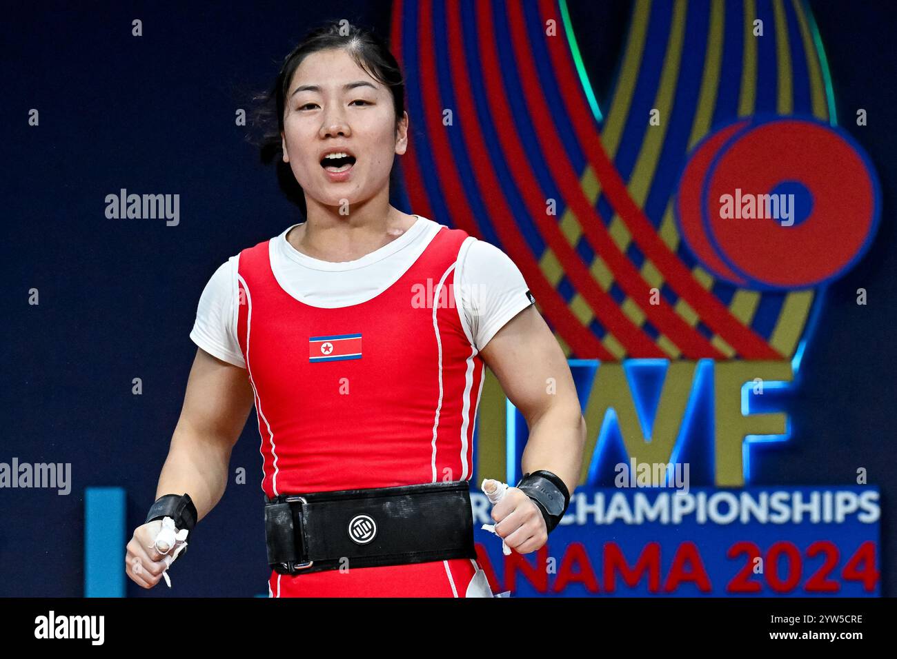Hyon Gyong Kang of North Korea competes in snatch, in the 55 kg women ...