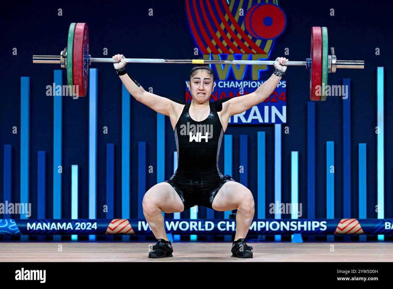 Aleksandra Grigoryan of Armenia competes in snatch, in the 55 kg women ...