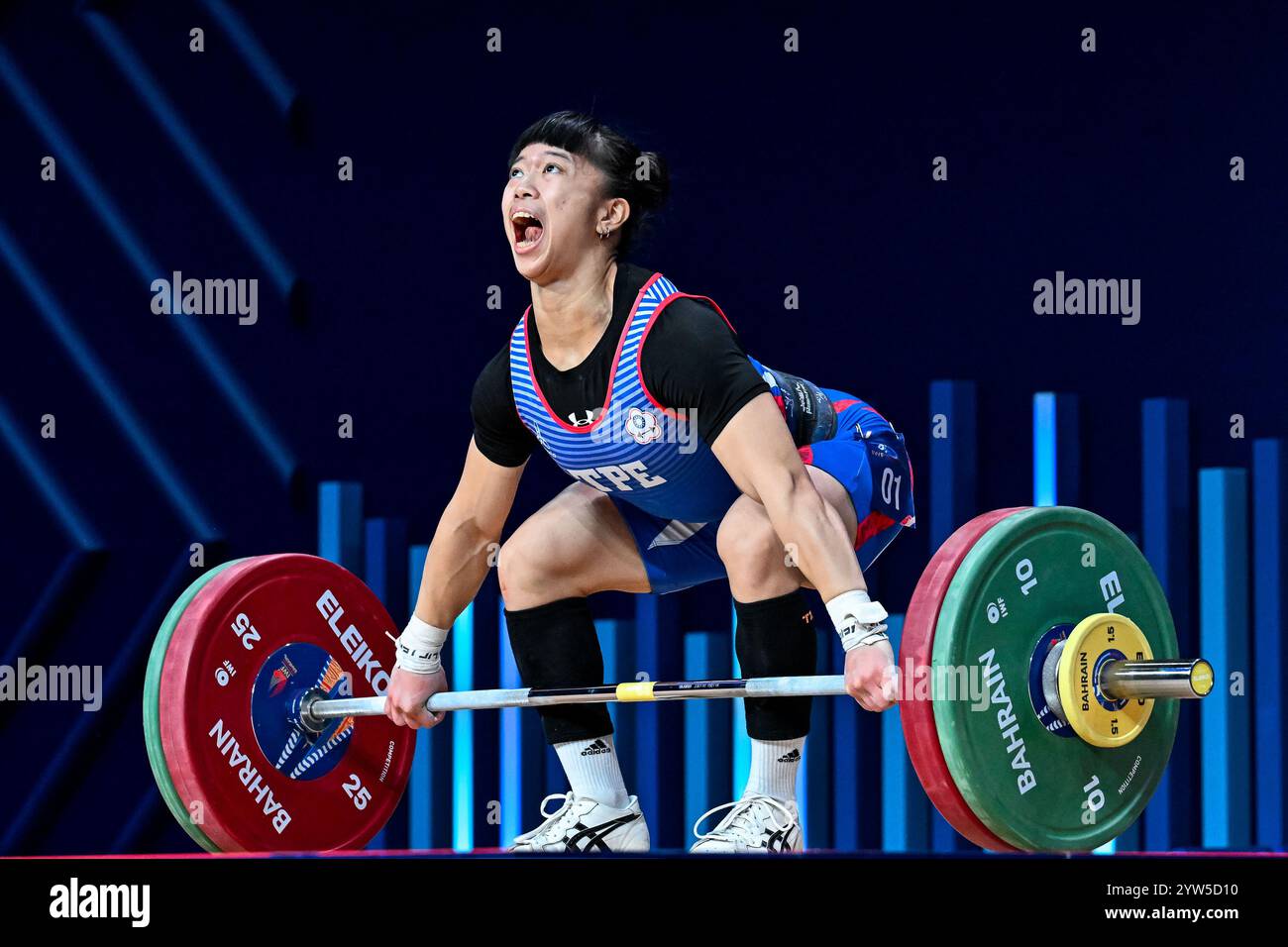 Guan-Ling Chen of Chinese Taipei competes in snatch, in the 55 kg women ...