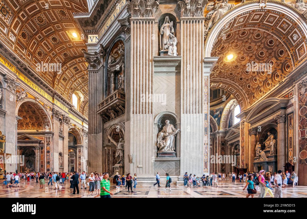 Rome, Italy, July 22 2017, Tourists admire the majestic interior of St ...