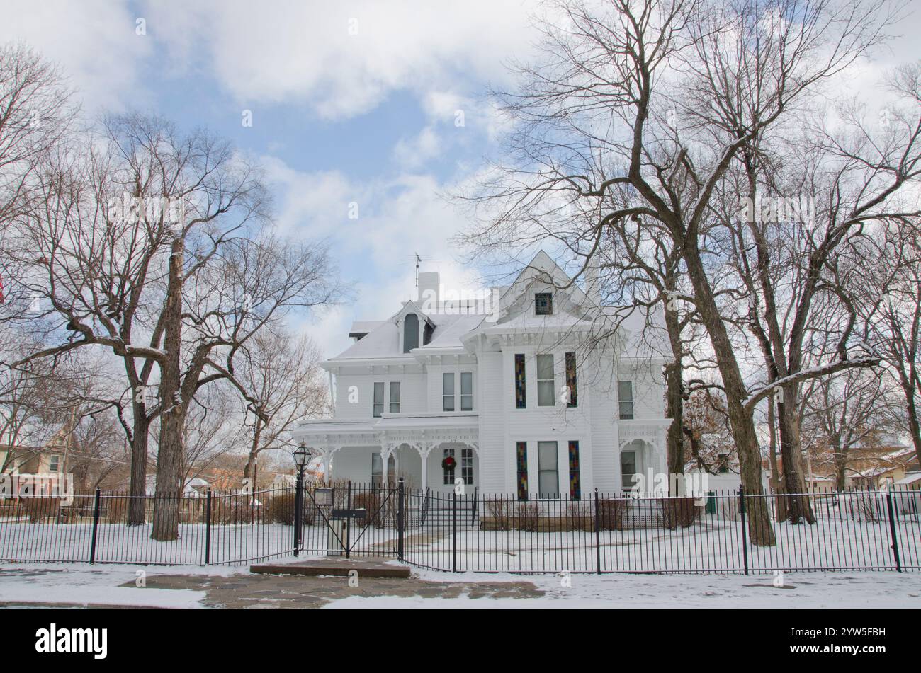 The Harry S Truman Home sits under a thin blanket of snow in ...