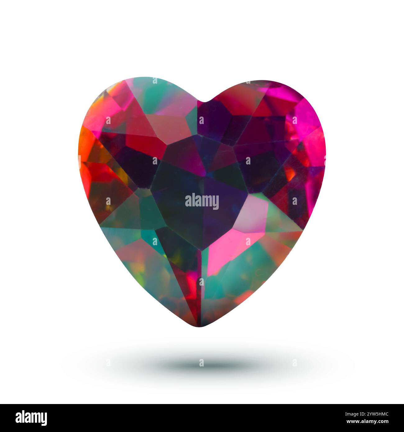 Colorful heart shaped shiny gemstone in air on white background Stock ...