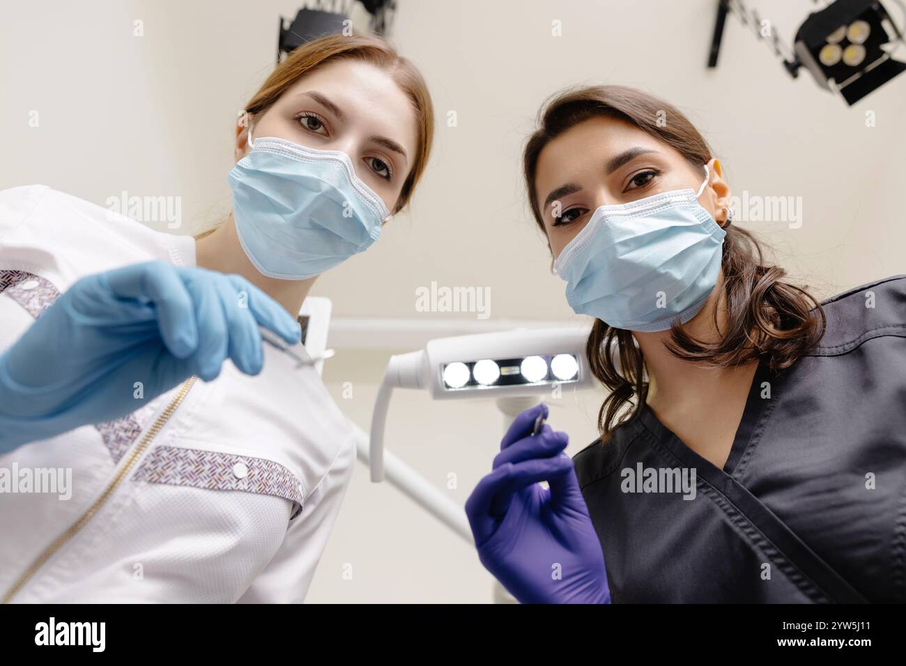 Female bending over hi-res stock photography and images - Alamy