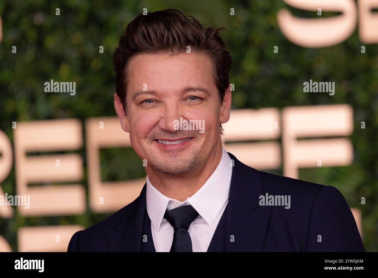 Jeremy Renner poses for photographers upon arrival of the film 'We Live ...