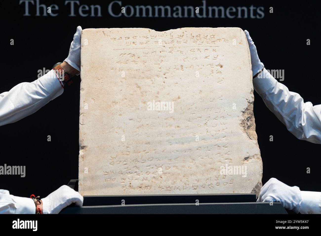 New York, USA. 09th Dec, 2024. Workers hold during press preview the ...