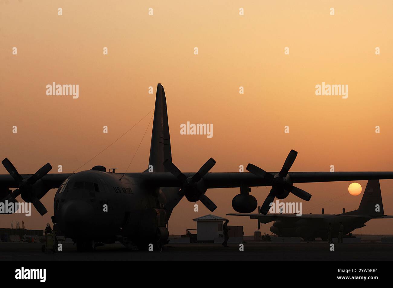 C-130 Hercules aircraft stand by for missions at an air base in the ...