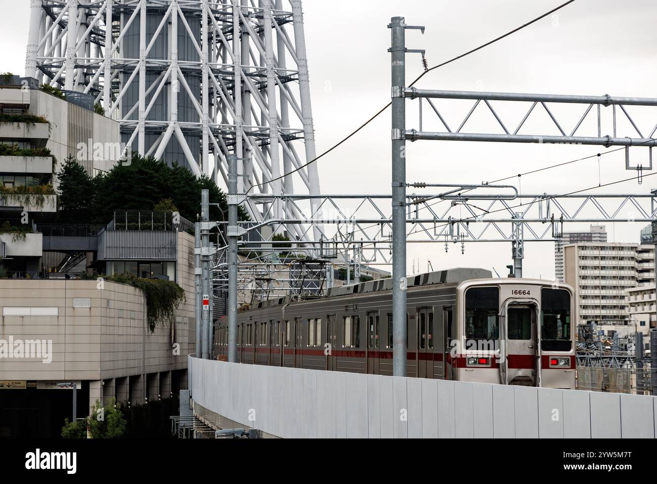 Tokyo public transportation. A train approaches Tokyo SkyTree station ...