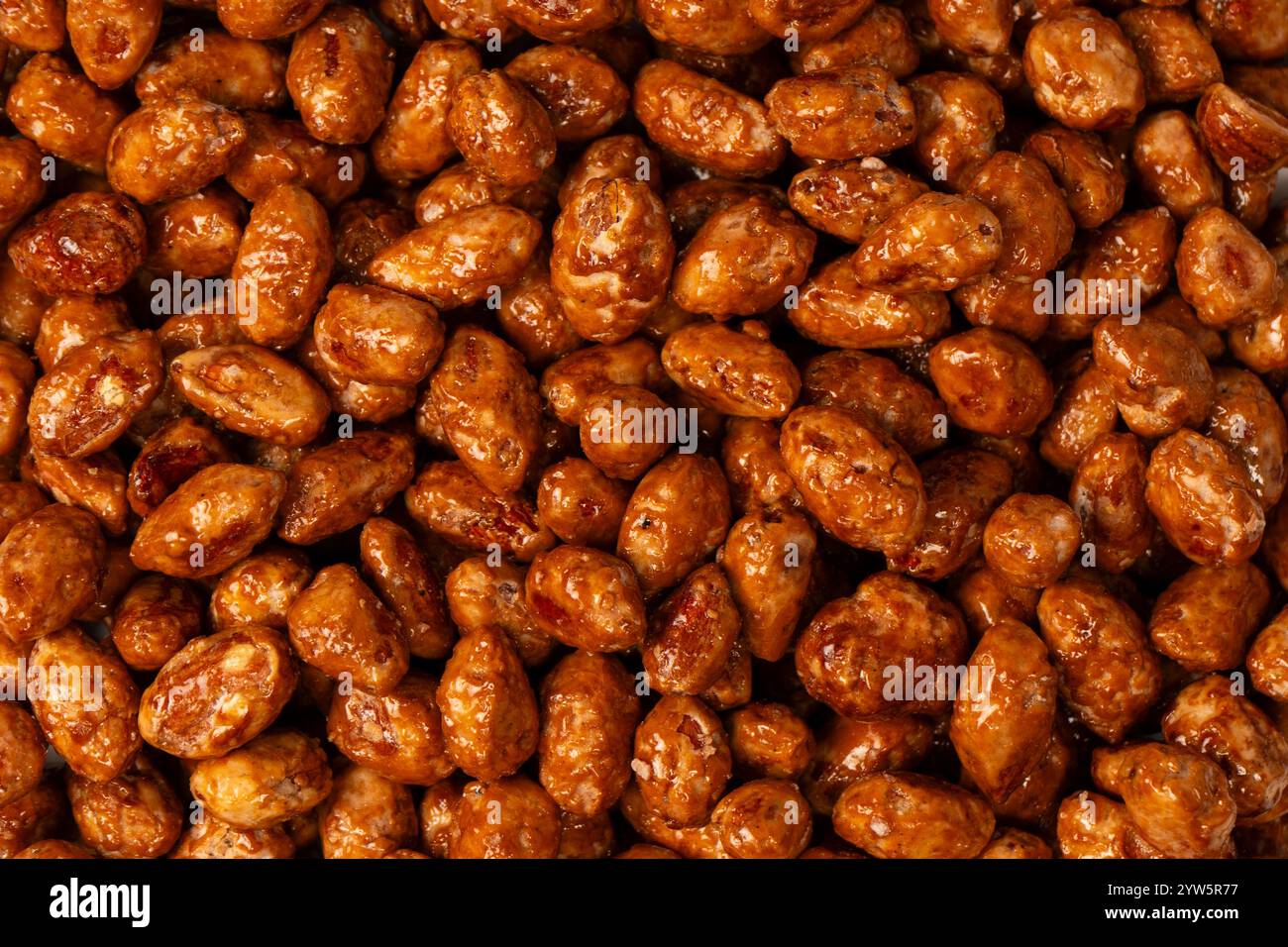 Tasty sweet roasted peanuts as a background Stock Photo - Alamy