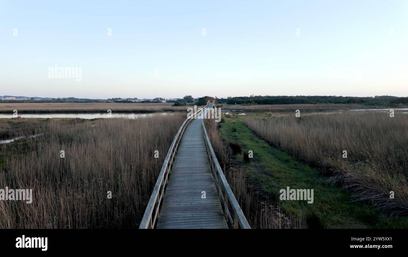 Wooden structure on the footbridges of Barrinha de Esmoriz with water ...