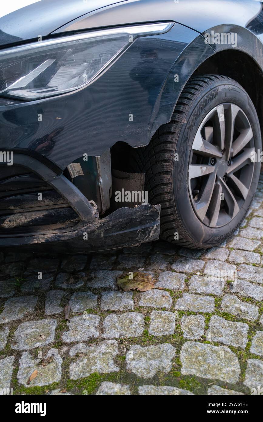 a car is badly damaged after a collision with a wild boar Stock Photo ...