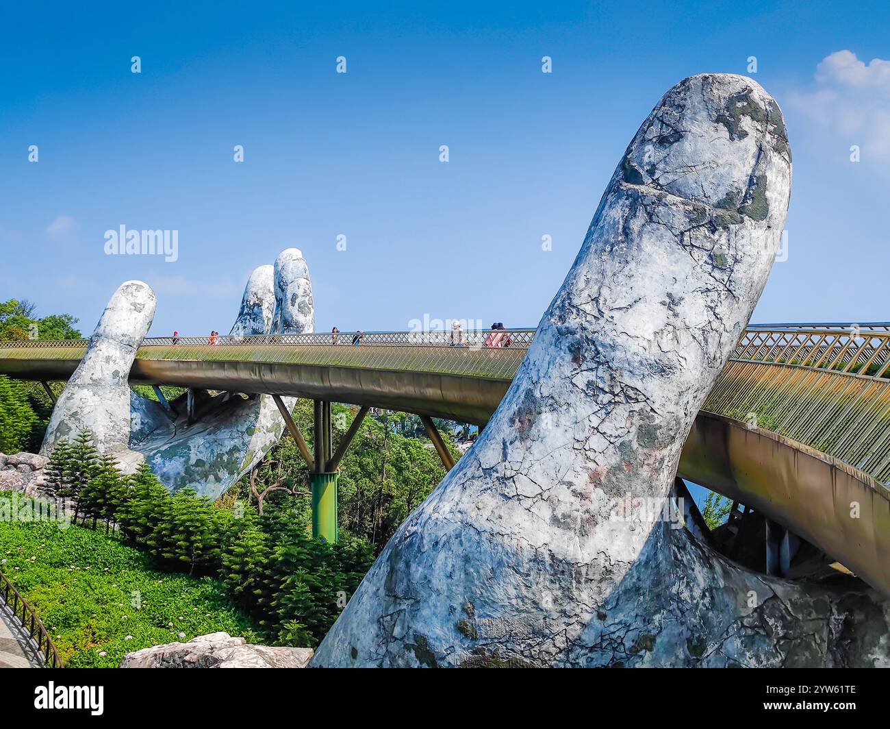 Golden Bridge in Ba Na hills, Da Nang, Vietnam on a sunny day. Lifted ...