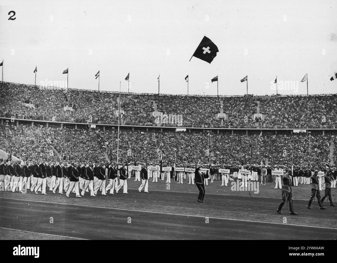 Swiss athletes parade in the Olympic Stadium during the opening ...