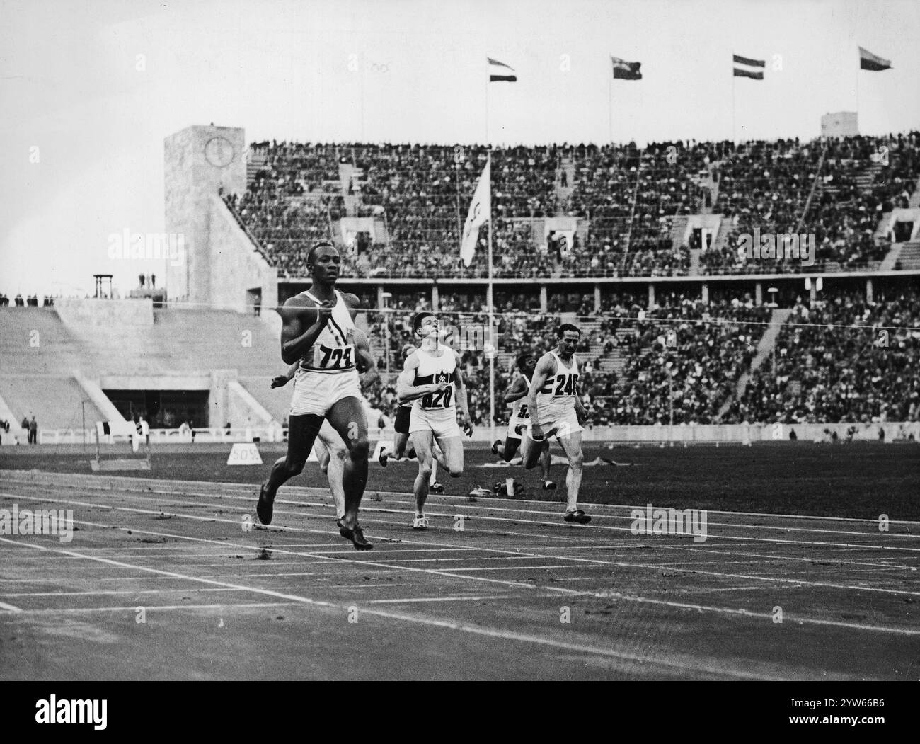 The men's 200-meter race. Gold medalist Jesse Owens runs ahead. Archive ...