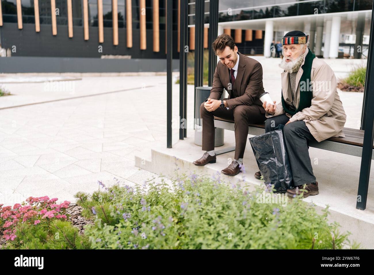 Remote view of cheerful business man in formal attire attentively ...