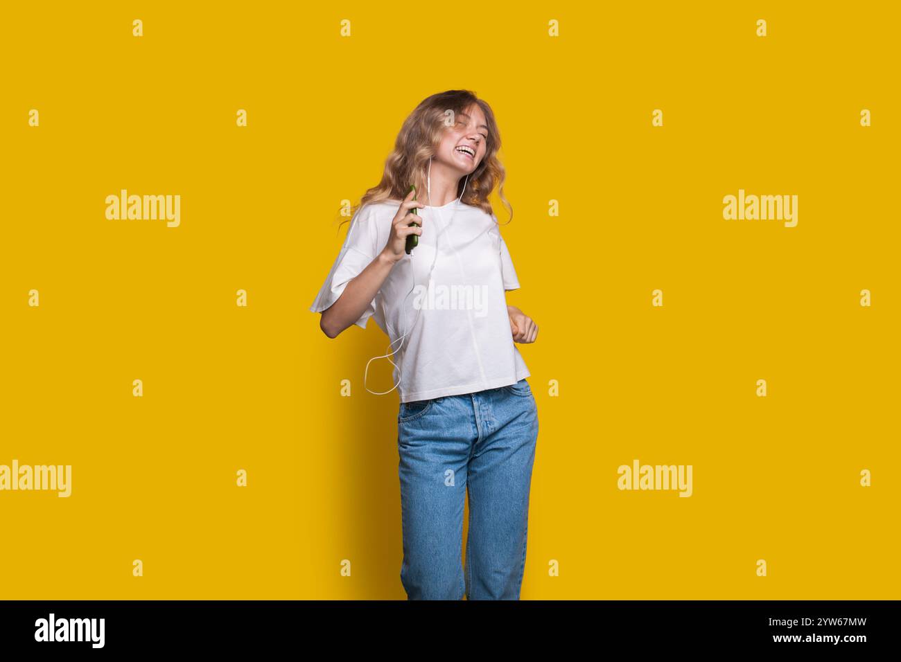 Dynamic joyful woman energetically dancing hi-res stock photography and ...