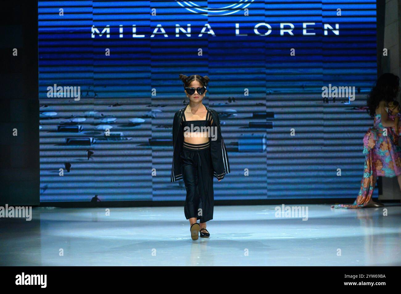 Toronto, ON, Canada - December 7, 2024: A model walks the runway at the ...
