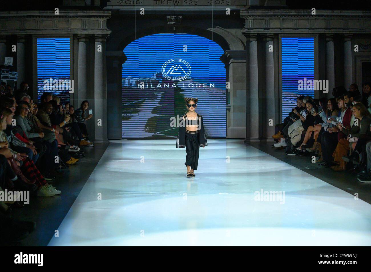 Toronto, ON, Canada - December 7, 2024: A model walks the runway at the ...
