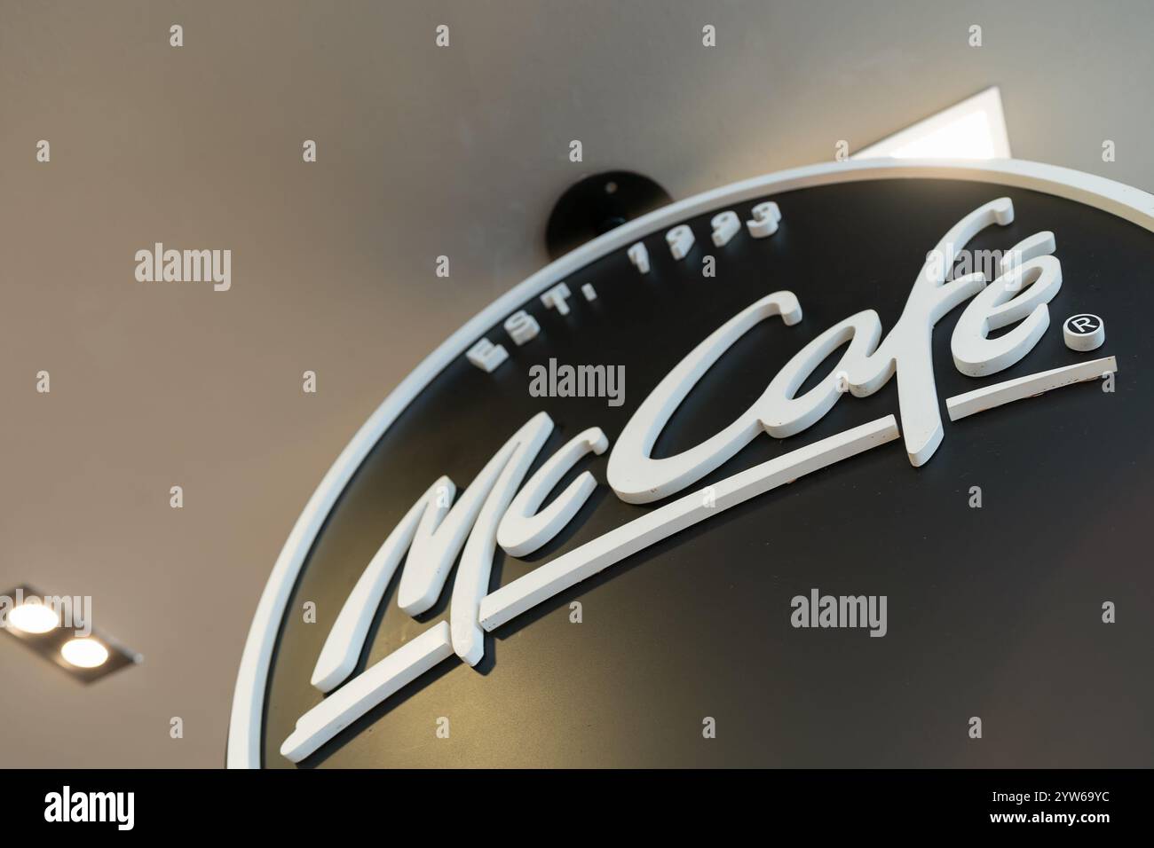SENAI, MALAYSIA - NOVEMBER 27, 2023: close up shot of McCafe sign as ...