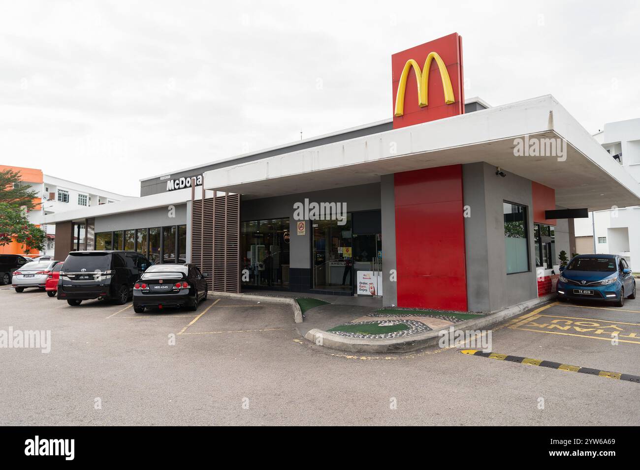 SENAI, MALAYSIA - NOVEMBER 27, 2023: street level view of McDonald's ...