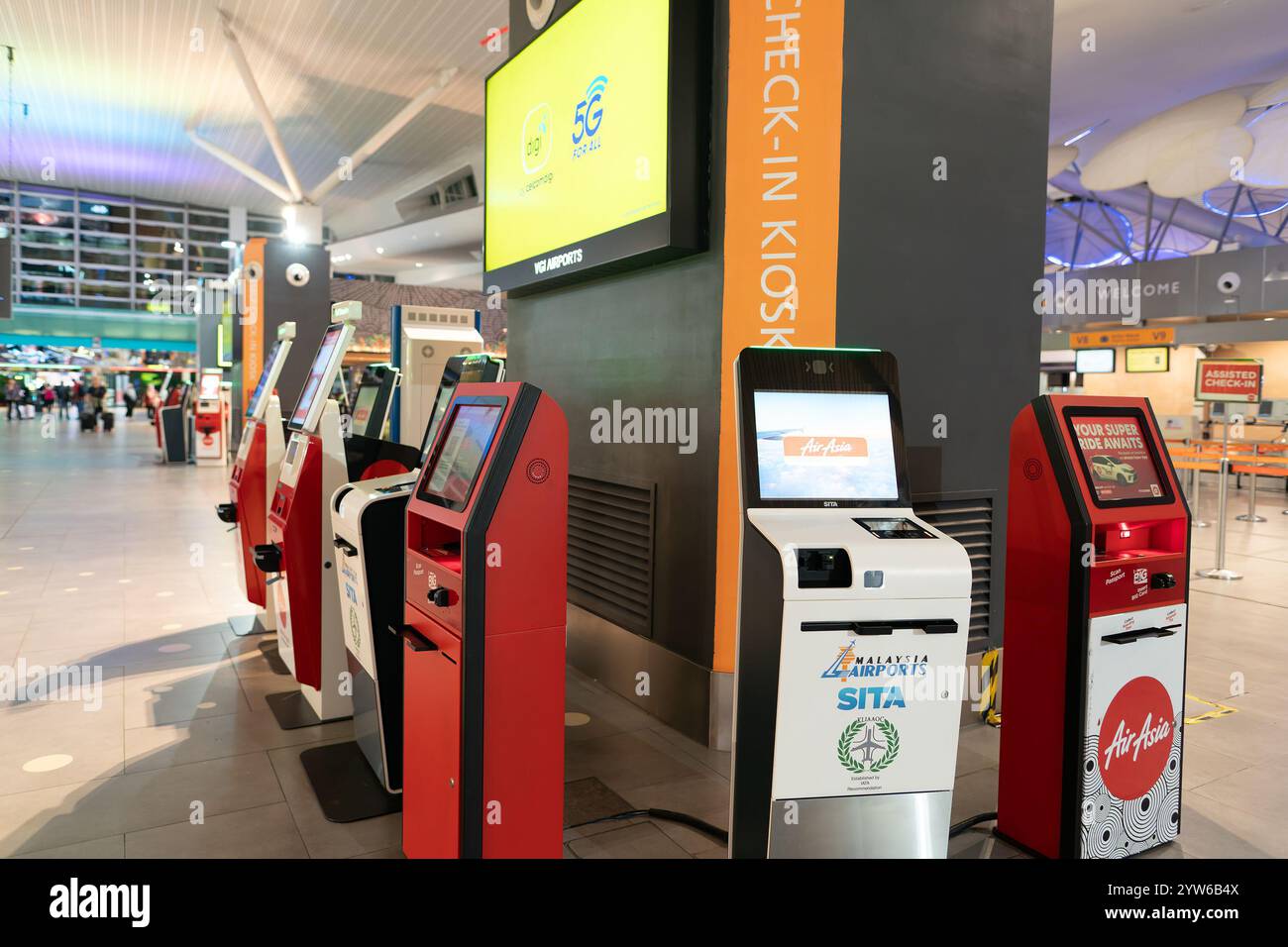 KUALA LUMPUR, MALAYSIA - NOVEMBER 21, 2023: self check-in kiosks at ...