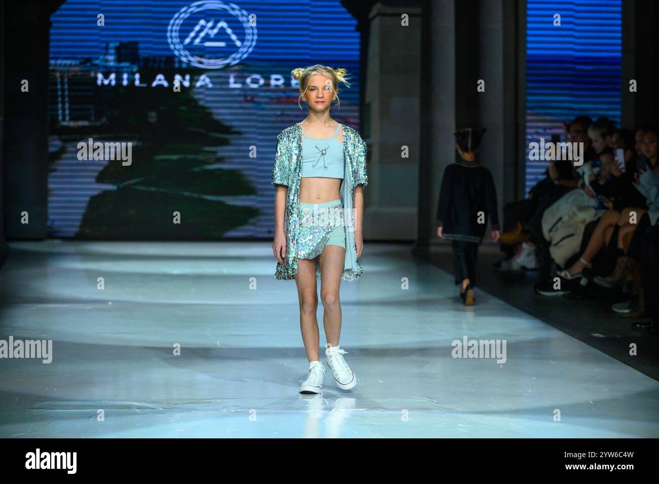 Toronto, ON, Canada - December 7, 2024: A model walks the runway at the ...