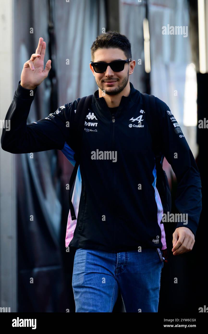 BWT Alpine F1 Team driver Esteban Ocon, of France, enters the paddock ...
