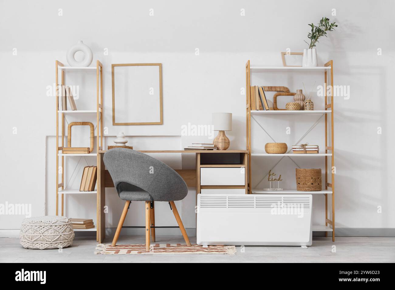 Interior of light office with workplace, shelf units and electric ...