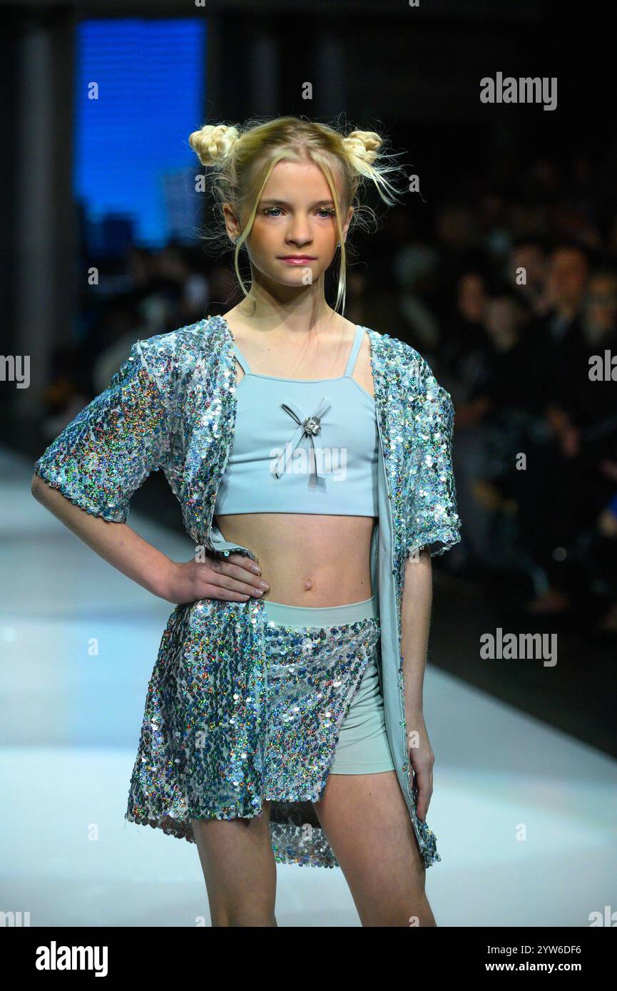 Toronto, ON, Canada - December 7, 2024: A model walks the runway at the ...
