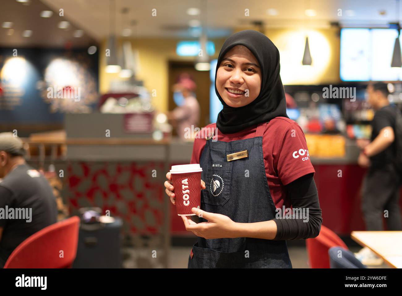 KUALA LUMPUR, MALAYSIA - NOVEMBER 22, 2023: indoor portrait of staff in ...