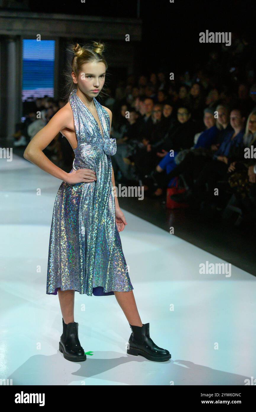 Toronto, ON, Canada - December 7, 2024: A model walks the runway at the ...