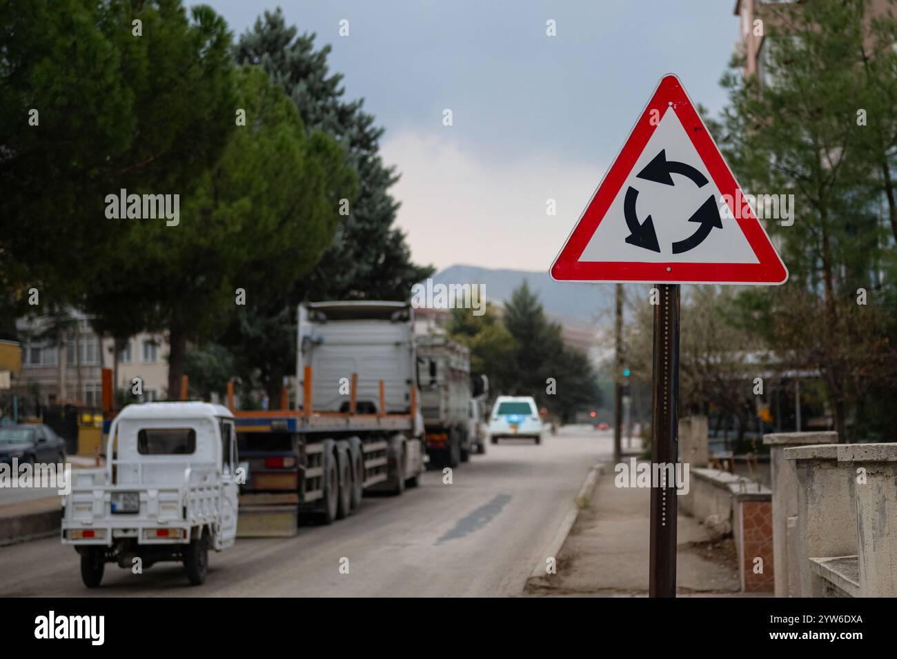 Roundabout road sign on the street Stock Photo - Alamy