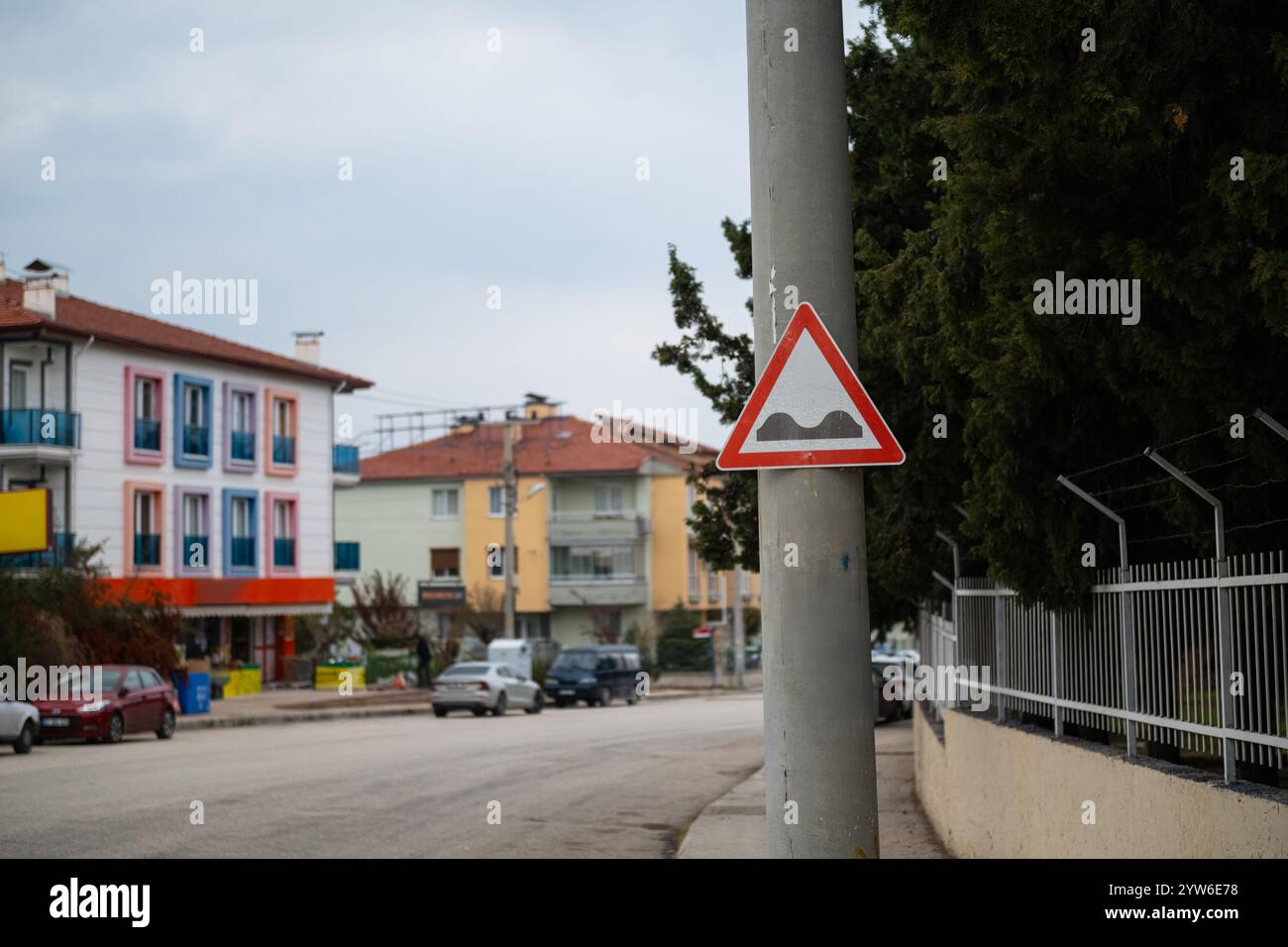 Uneven road sign hi-res stock photography and images - Alamy