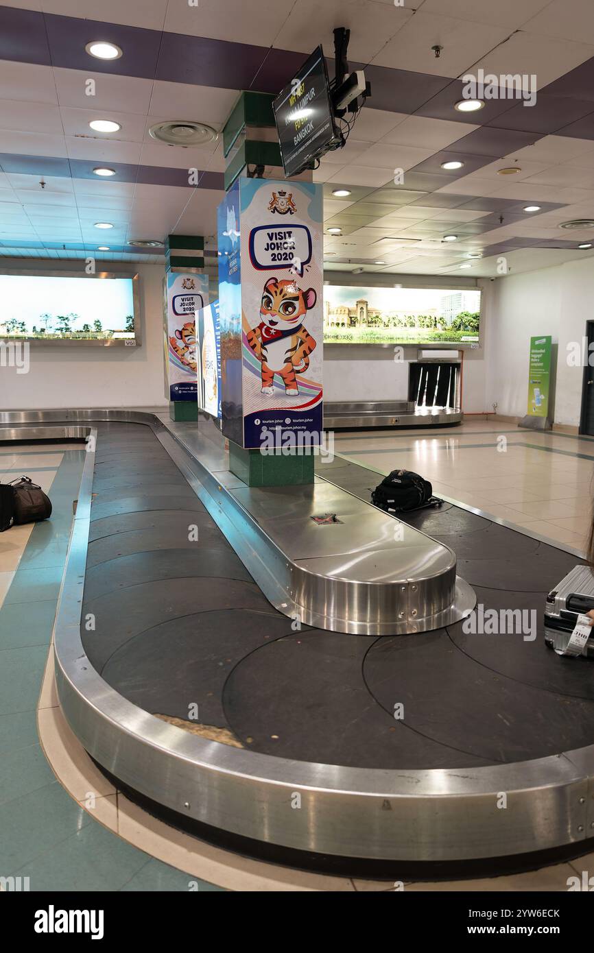 SENAI, MALAYSIA - NOVEMBER 22, 2023: baggage carousel in the arrivals ...