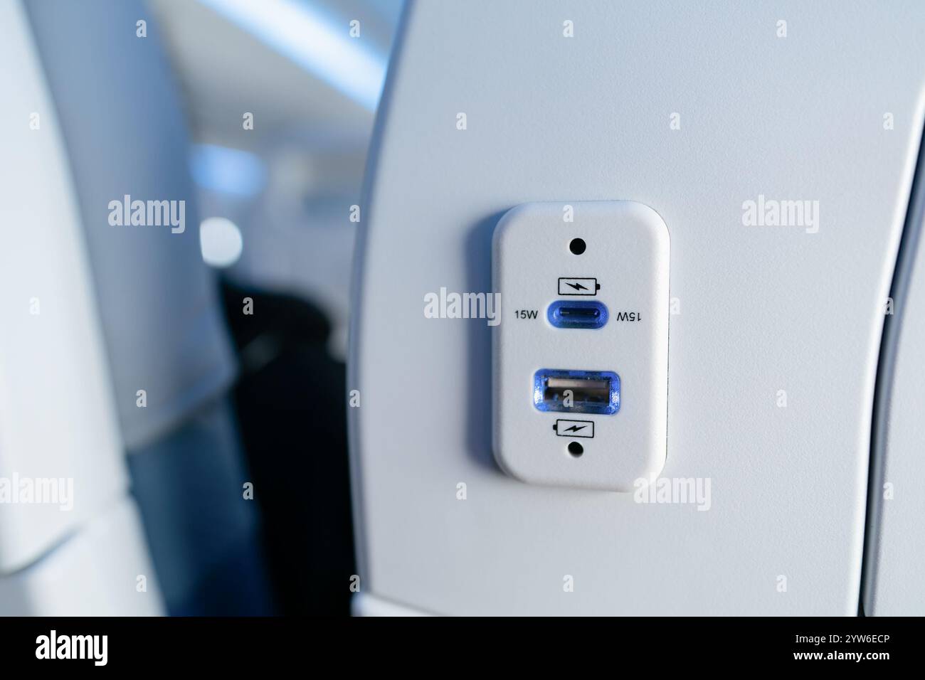 KUALA LUMPUR, MALAYSIA - NOVEMBER 22, 2023: USB port on a seat in a ...