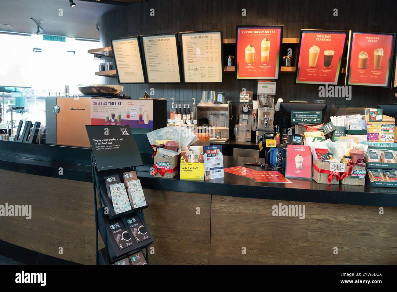 SENAI, MALAYSIA - NOVEMBER 22, 2023: retail area in Starbucks Coffee at ...