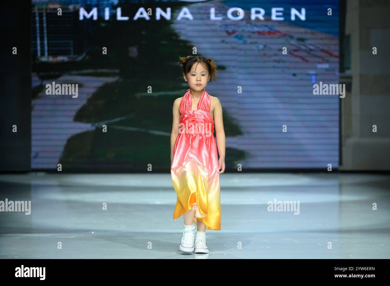 Toronto, ON, Canada - December 7, 2024: A model walks the runway at the ...