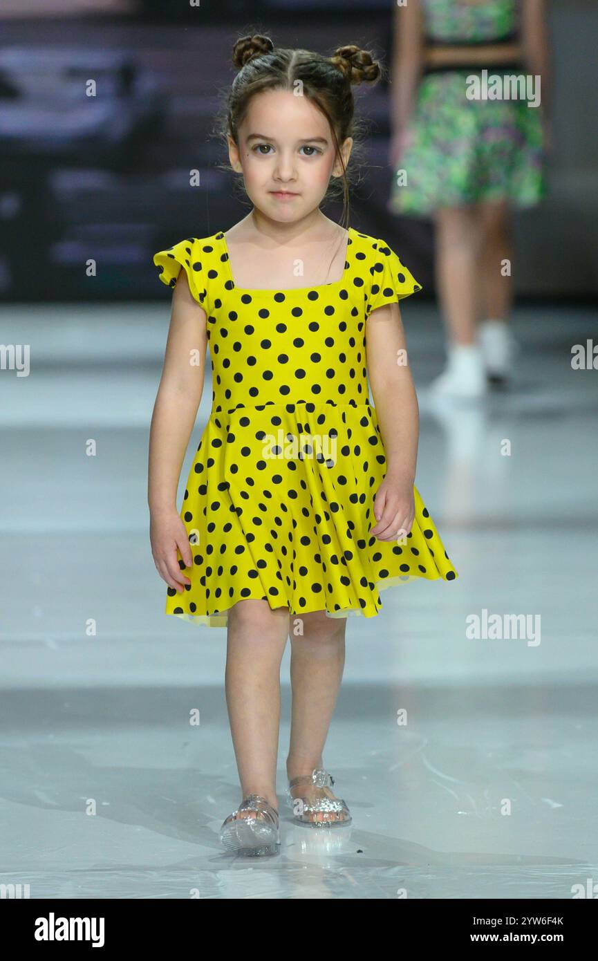 Toronto, ON, Canada - December 7, 2024: A model walks the runway at the ...