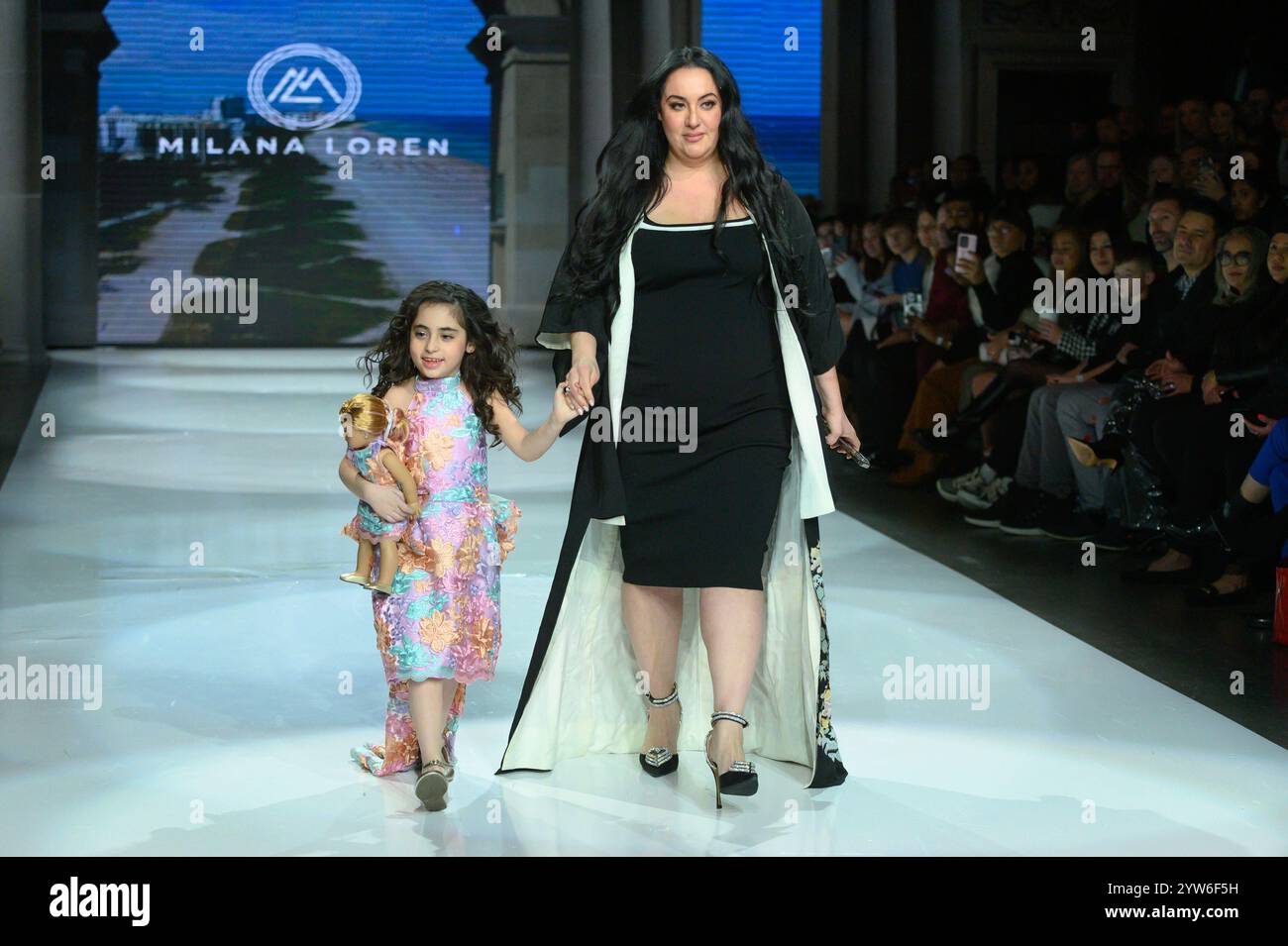 Toronto, ON, Canada - December 7, 2024: A model walks the runway at the ...