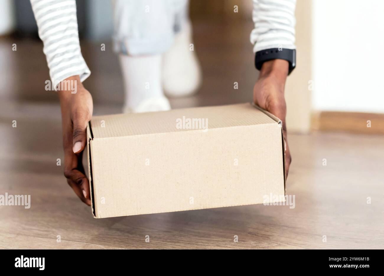 Unrecognizable Black Female Taking Delivered Parcel Box Entering Home ...