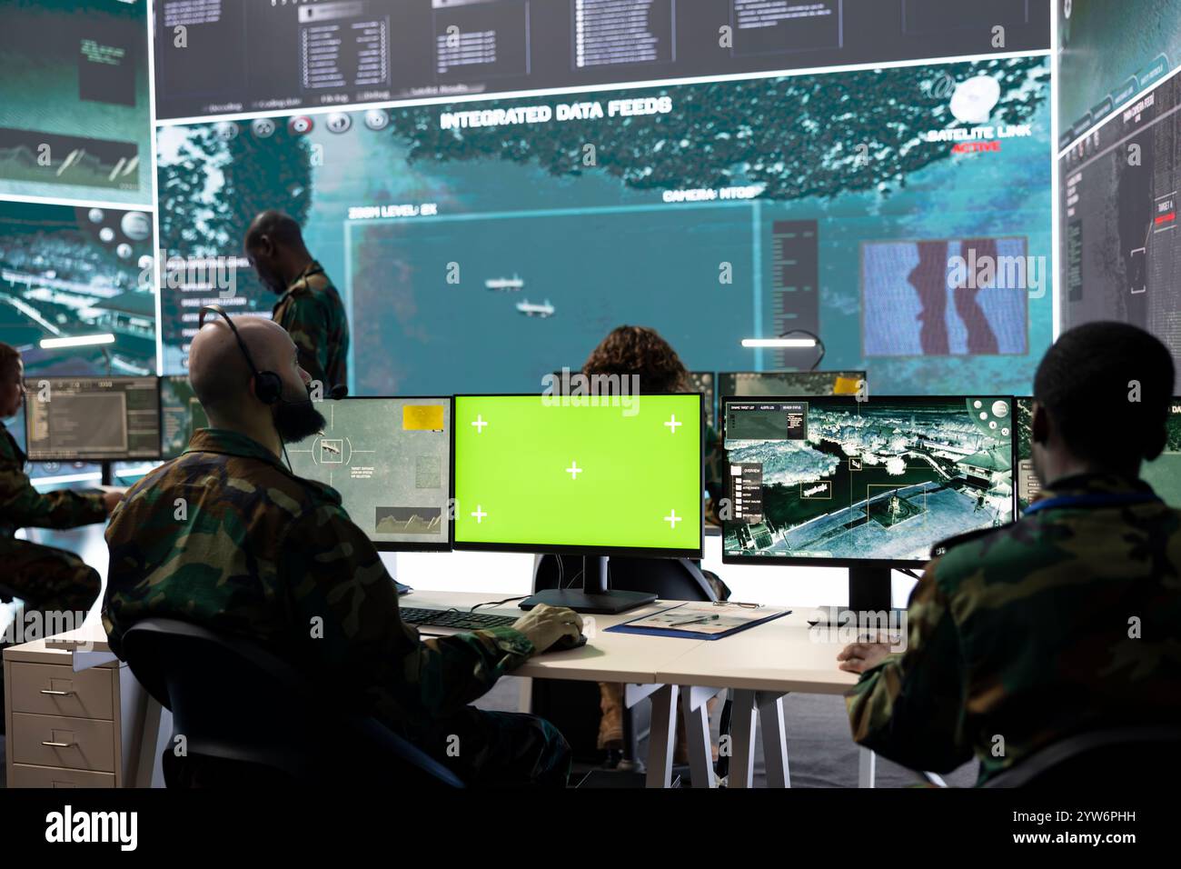 Military Personnel Works With Isolated Mockup Screen And Surveillance Footage Monitoring