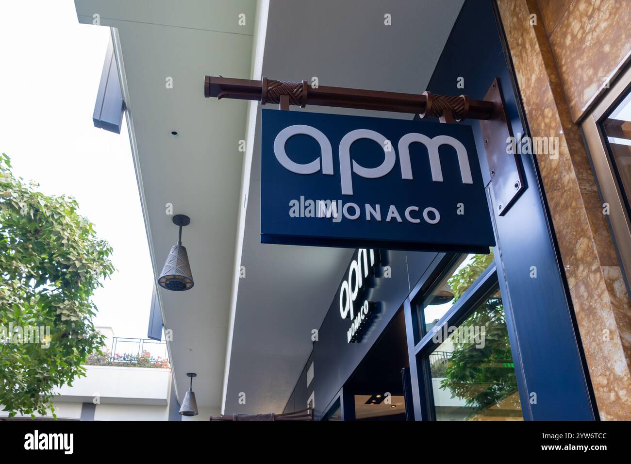 Honolulu, HI, USA - January 14, 2024: Close-up of the APM Monaco logo ...