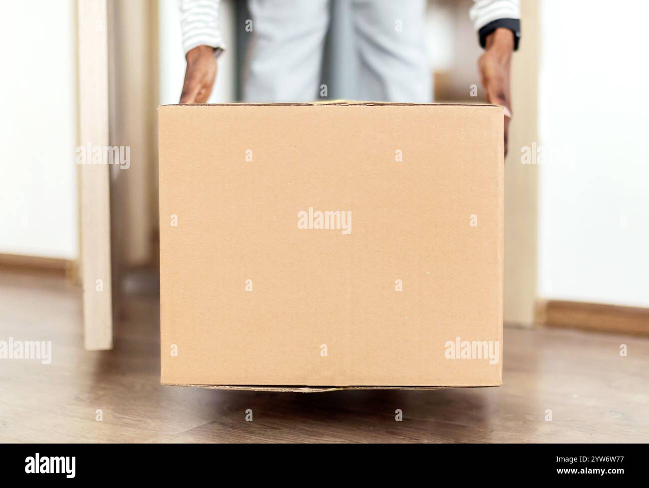 African american woman putting clothes hi-res stock photography and ...