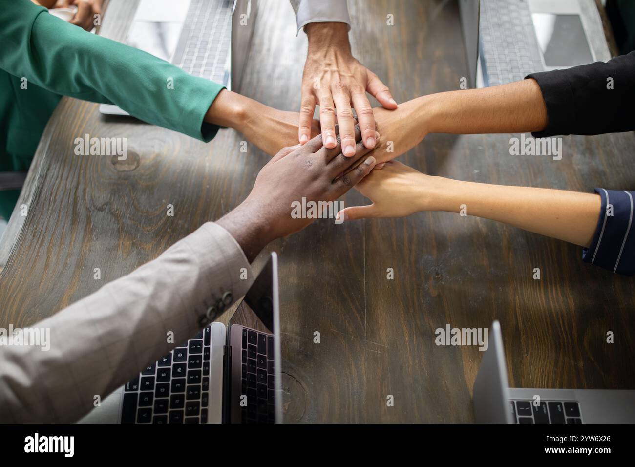 Teamwork and collaboration in a diverse corporate office setting Stock ...