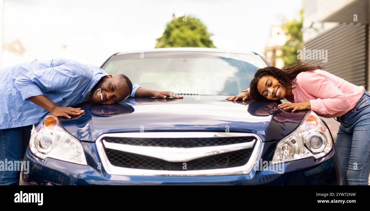 Happy African American Couple Touching Hugging New Auto Stock Photo - Alamy