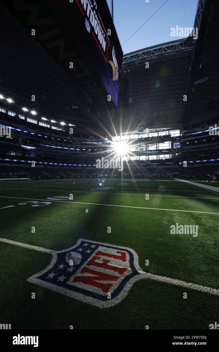 The NFL shield logo on the field at AT&T Stadium in a general stadium ...