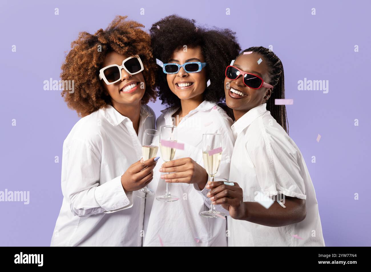 Celebrating friendship with laughter and joy among three young women ...