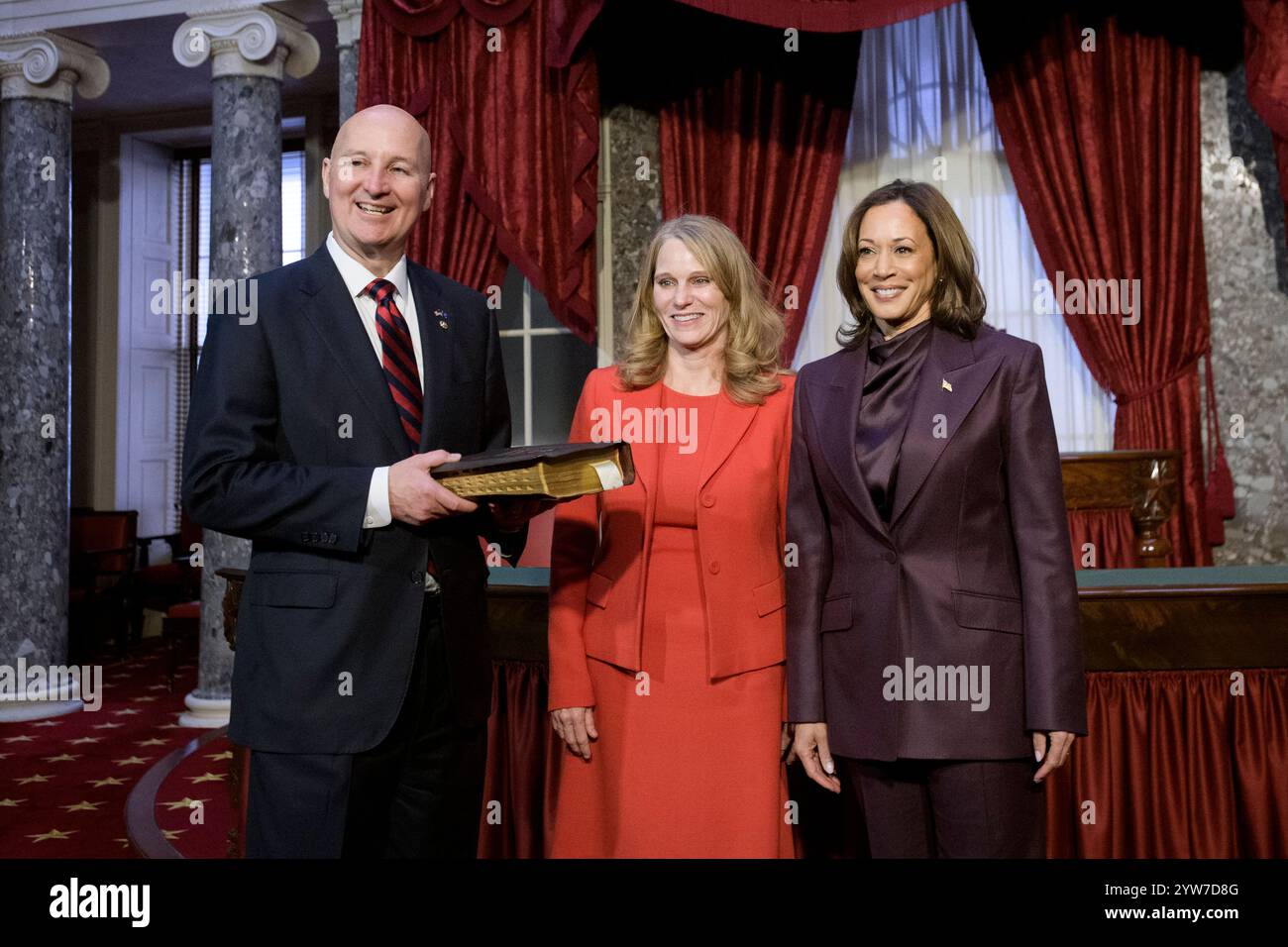 Vice President Kamala Harris, right, poses with Sen. Pete Ricketts, R ...
